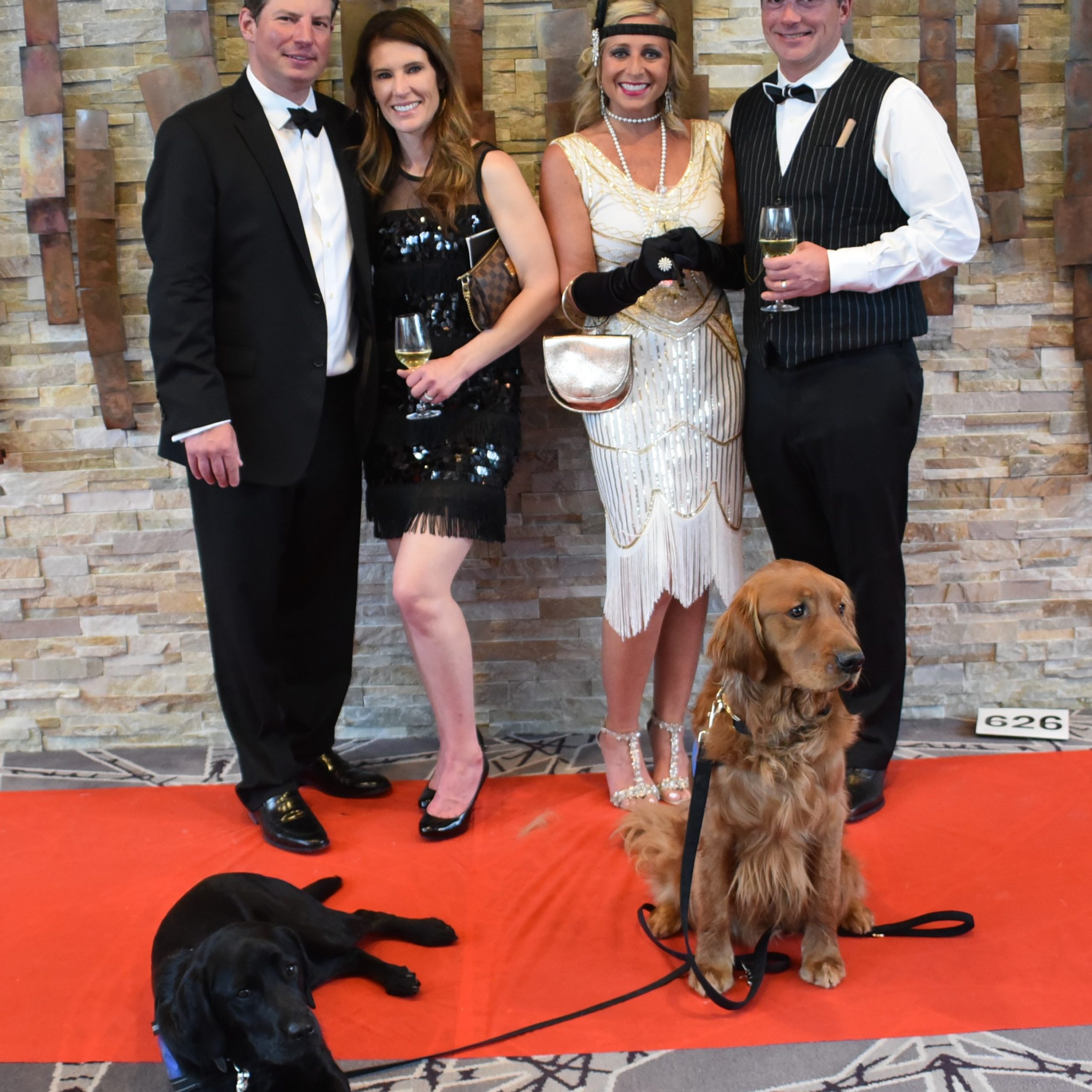 Christian and Janelle Hiles, left, with Susie and Tom Finley