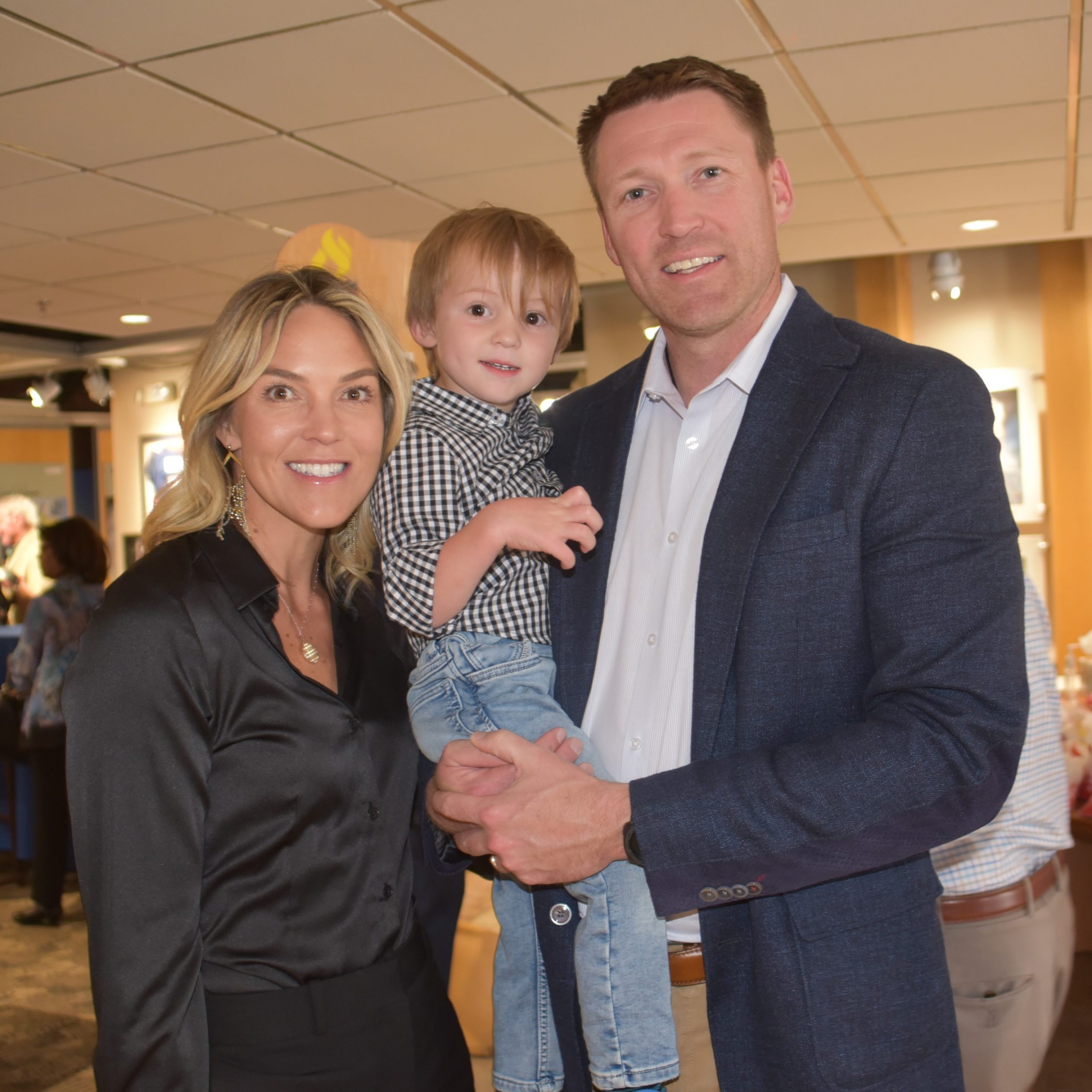 Coach Matt Hammer with his wife Mallery and son Max
