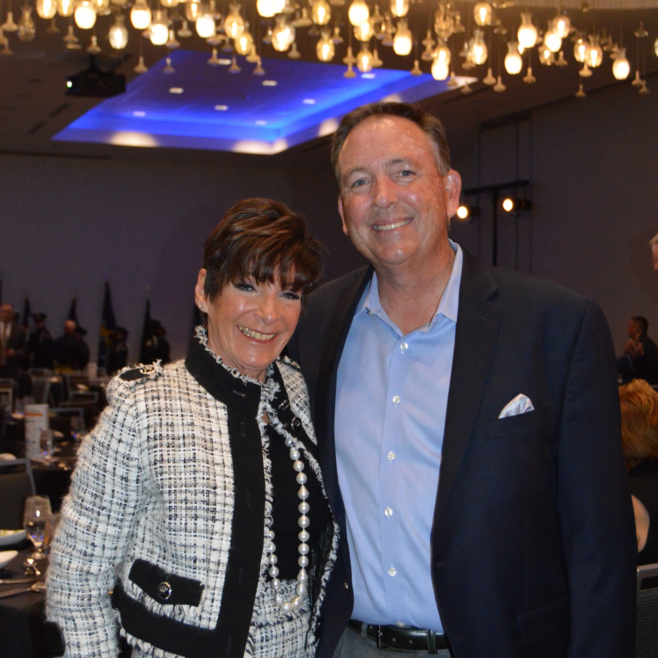 Christie Isenberg, Denver Police Foundation board member, and Dan Scherer