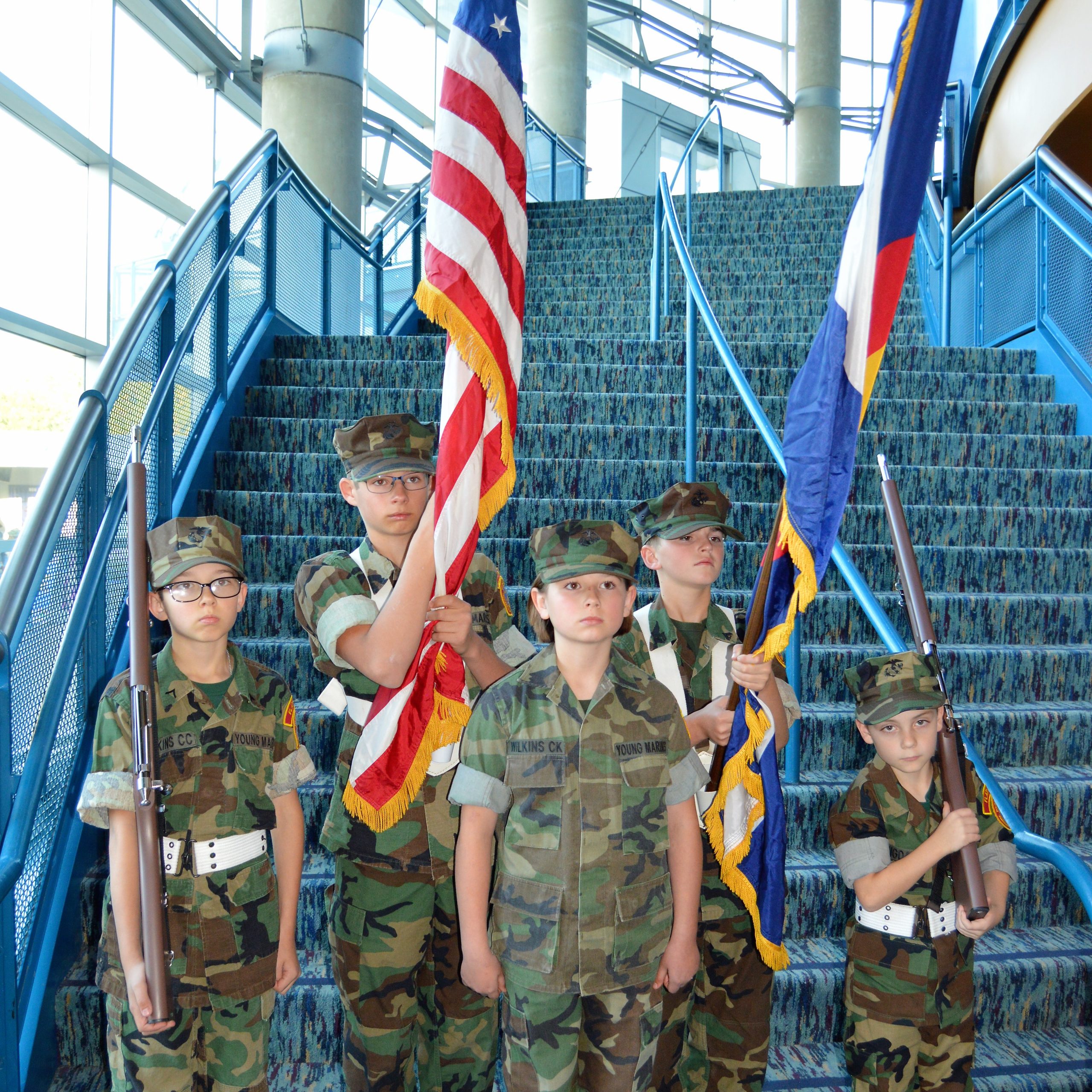 Flatirons Young Marines practice the presentation of colors.