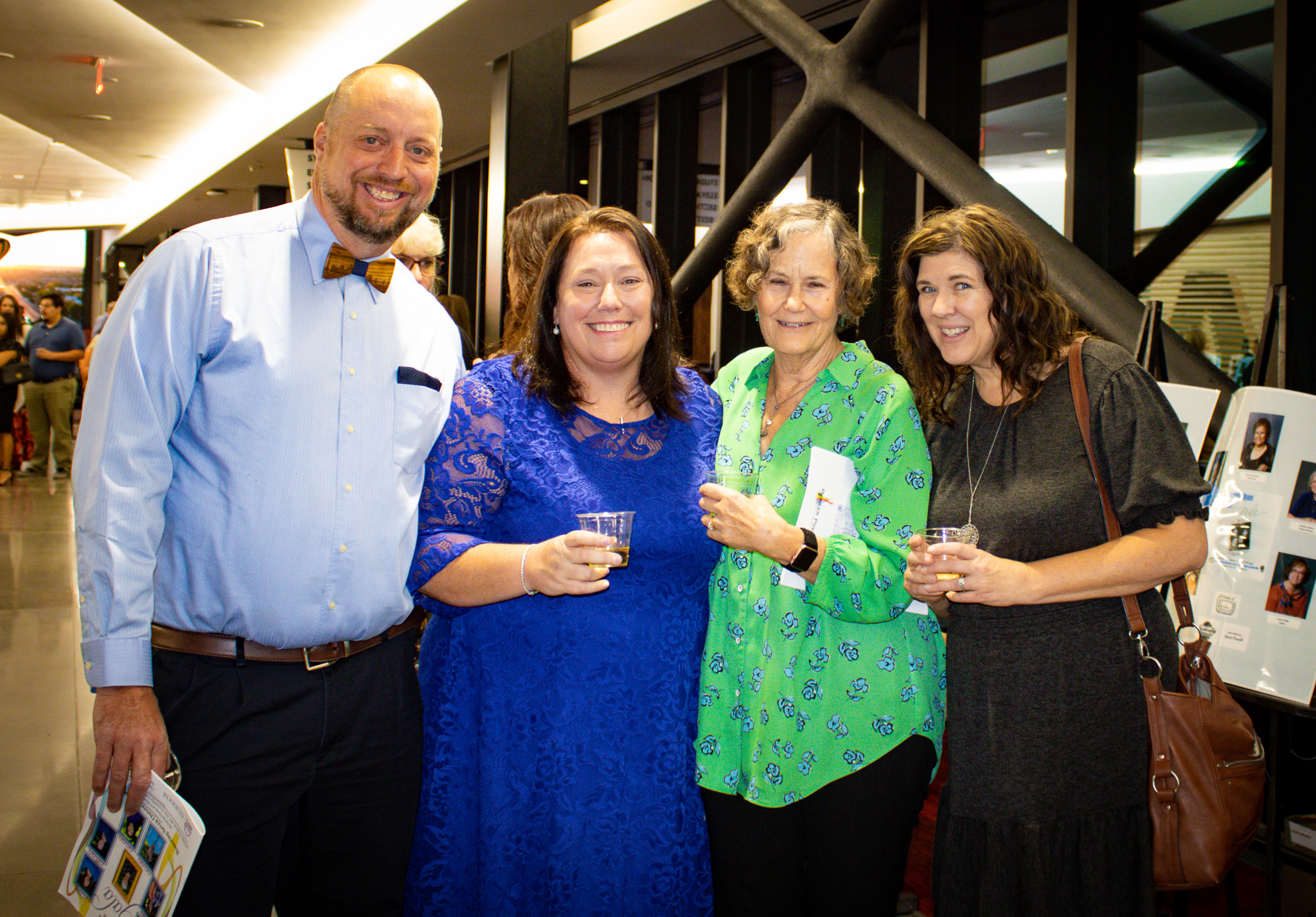 Outstanding Woman Honoree Lisa Taylor with her guests.