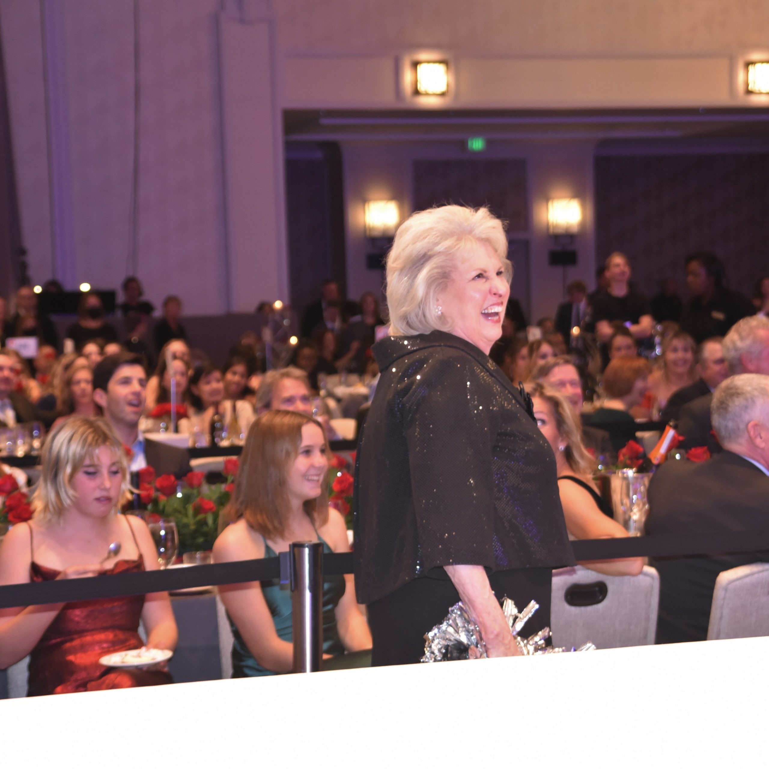 Edie Marks helps out with the auction