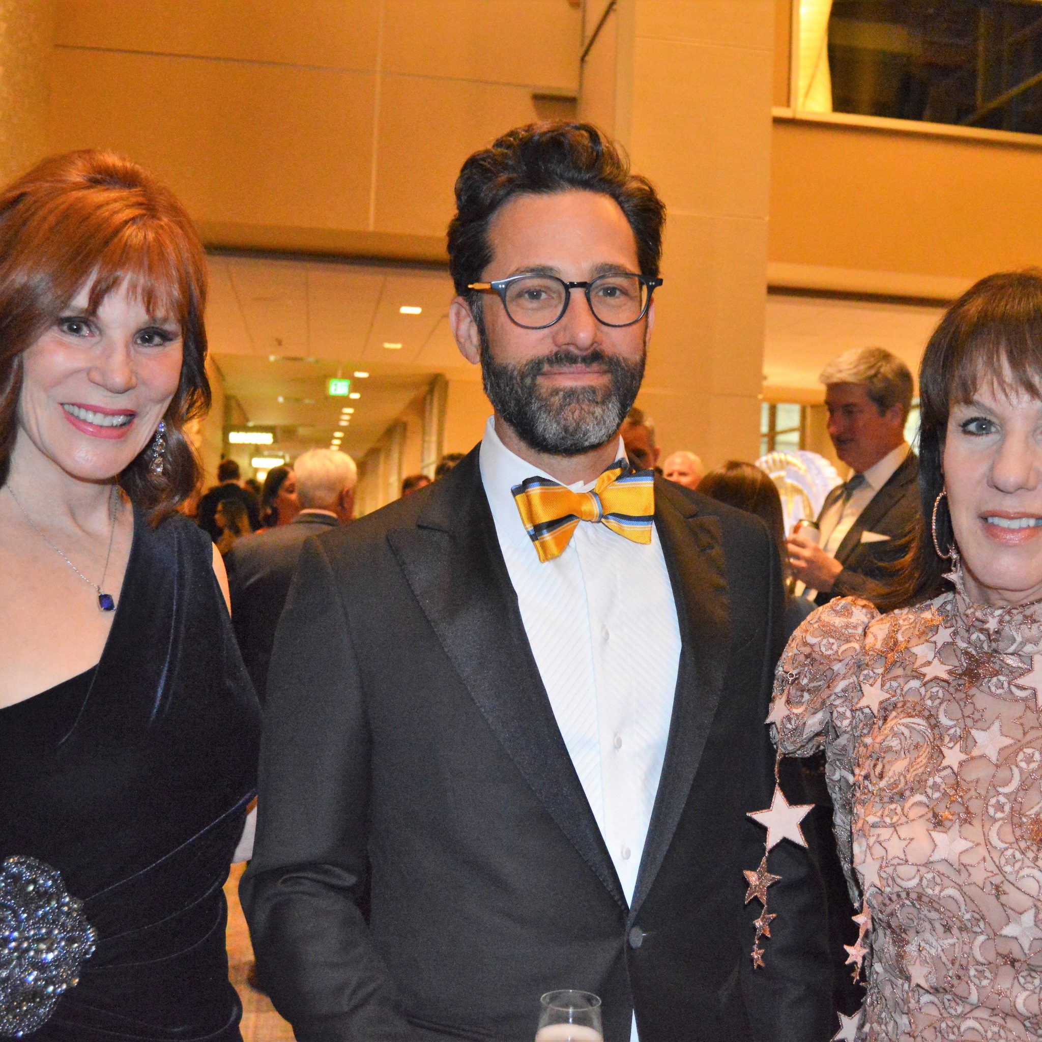 Gail Klapper with 2023 HOF inductee Mark Smith and his son Josh Smith
