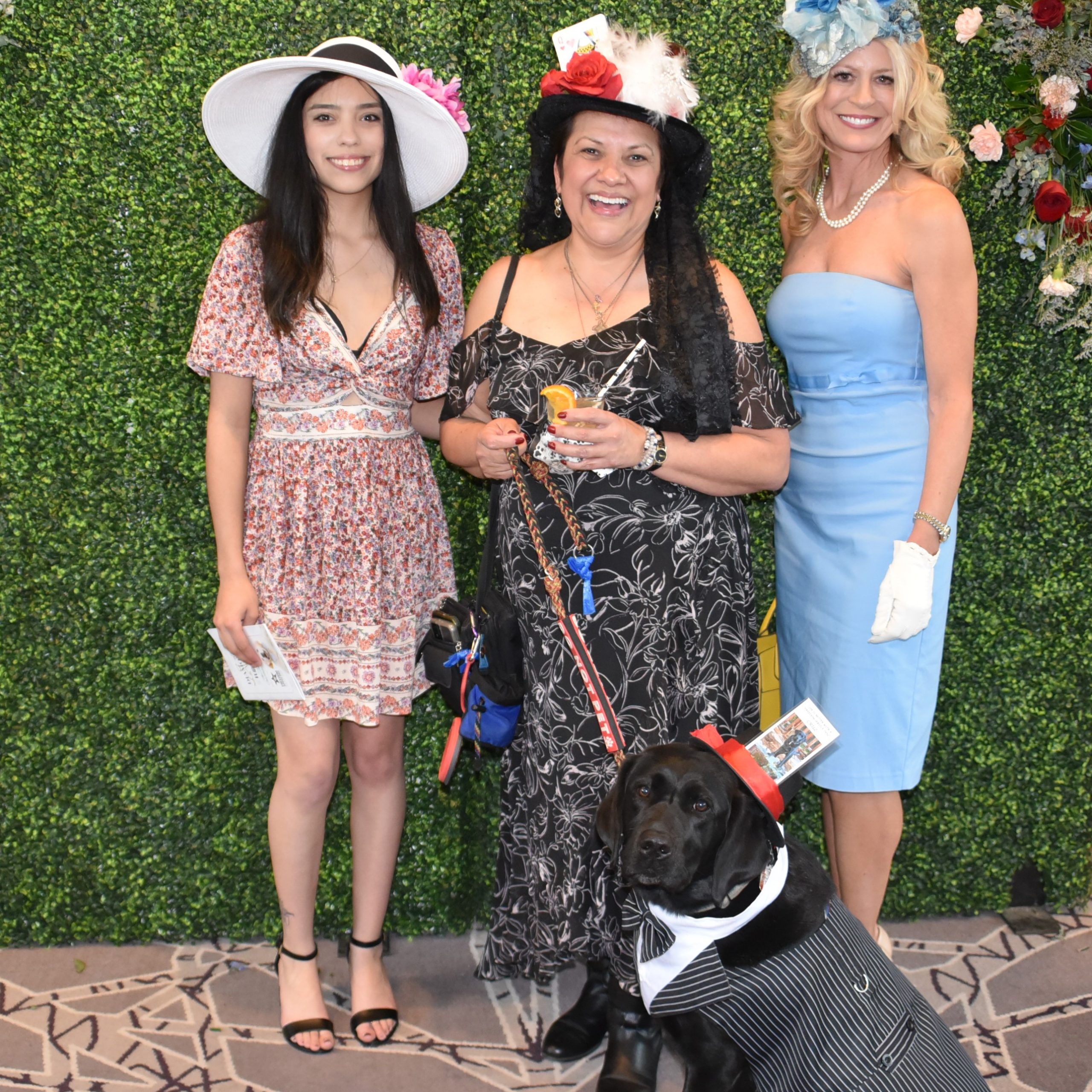Genevieve Denison, left, Yve Denison, Michele Fuentes with Cruz