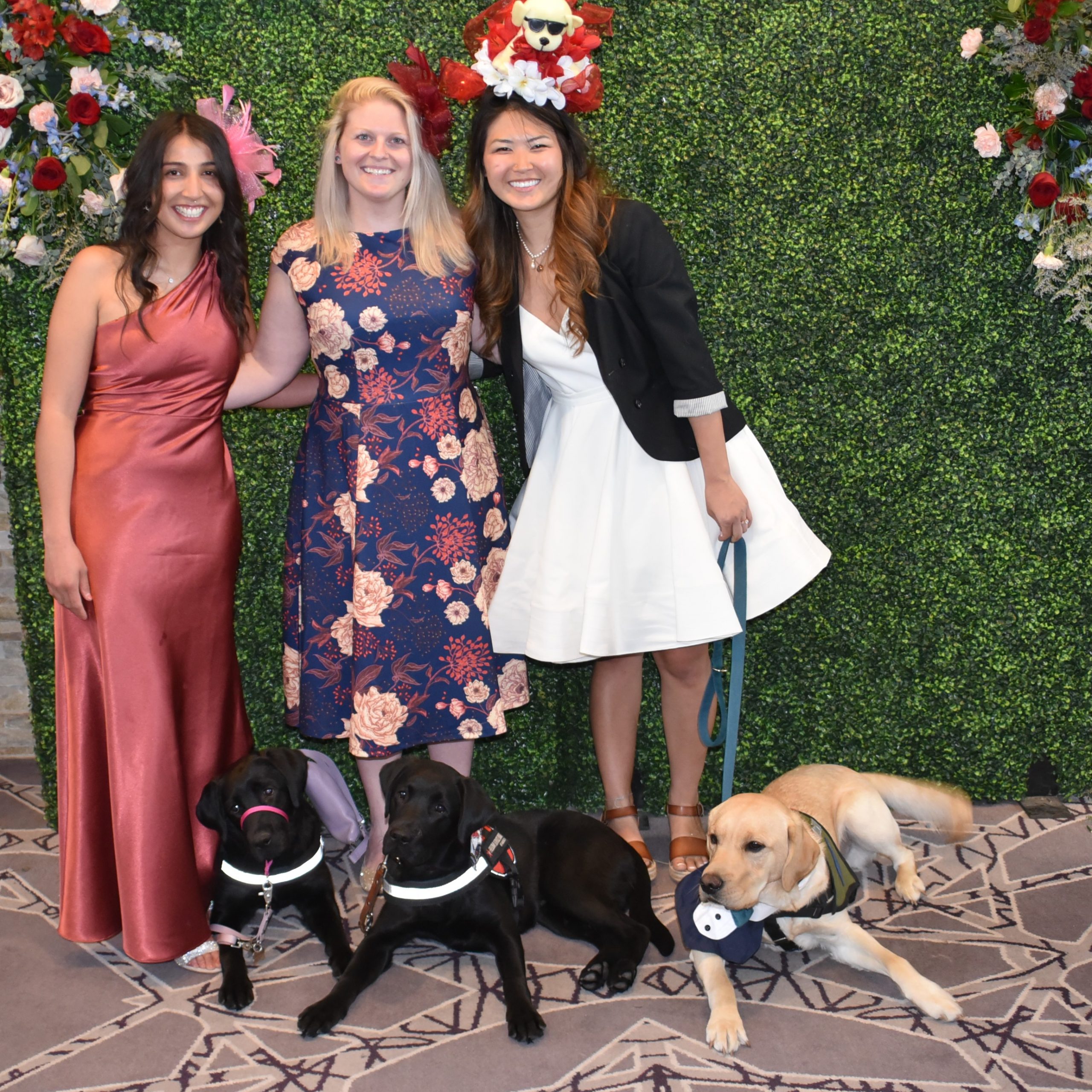 Karen Perez, left, Ashley Ayers, Izzy Greer with Fernie, Zamboni and Copper