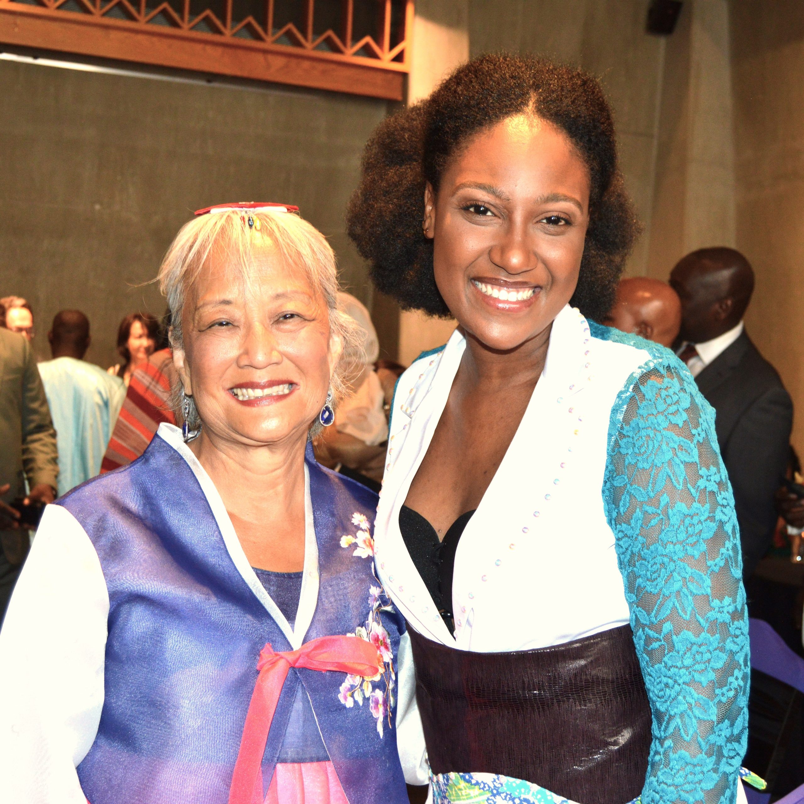 Vocalist Amira Abed (right), from Senegal, with host Becky Hogan