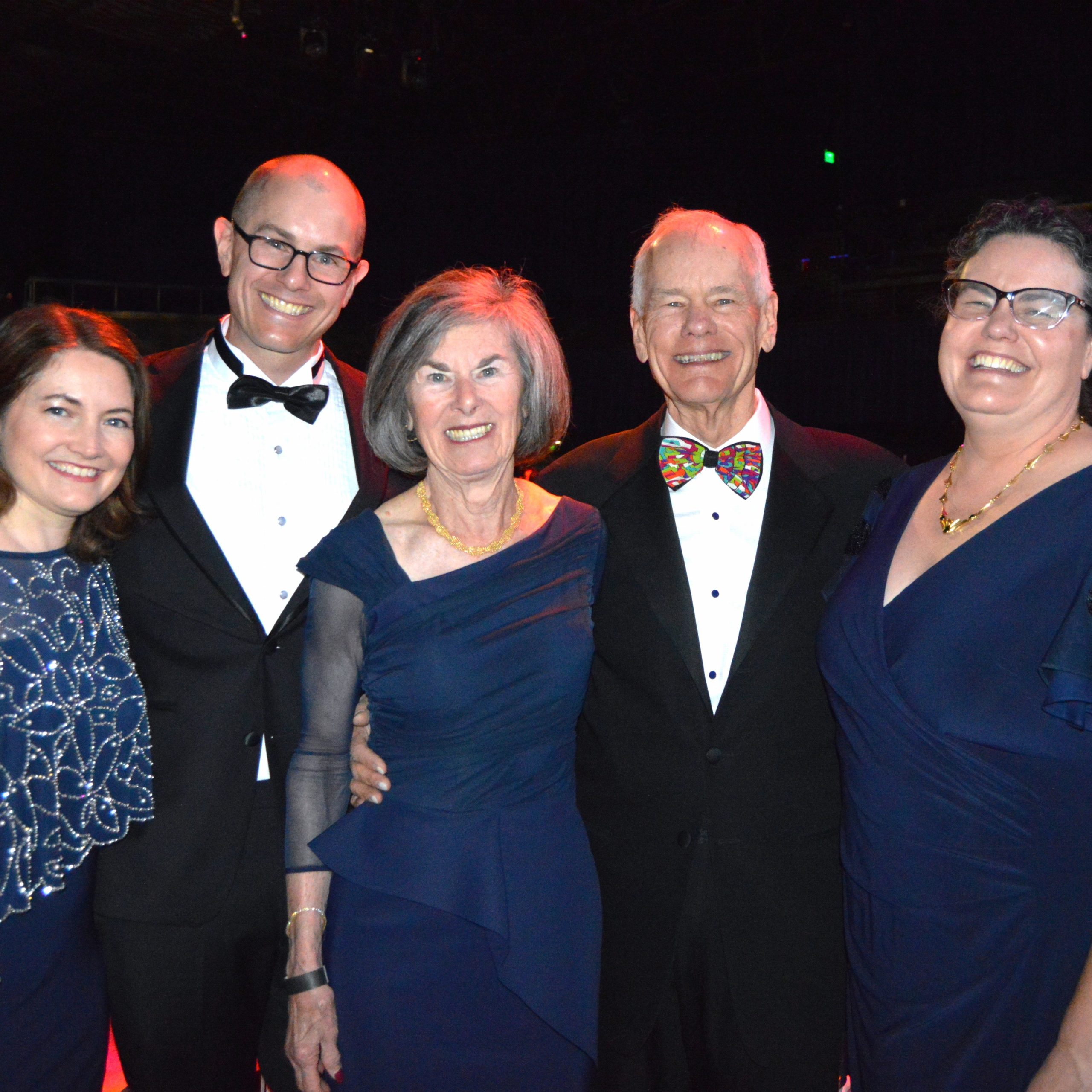Sharon and Jim Butler (center) with family