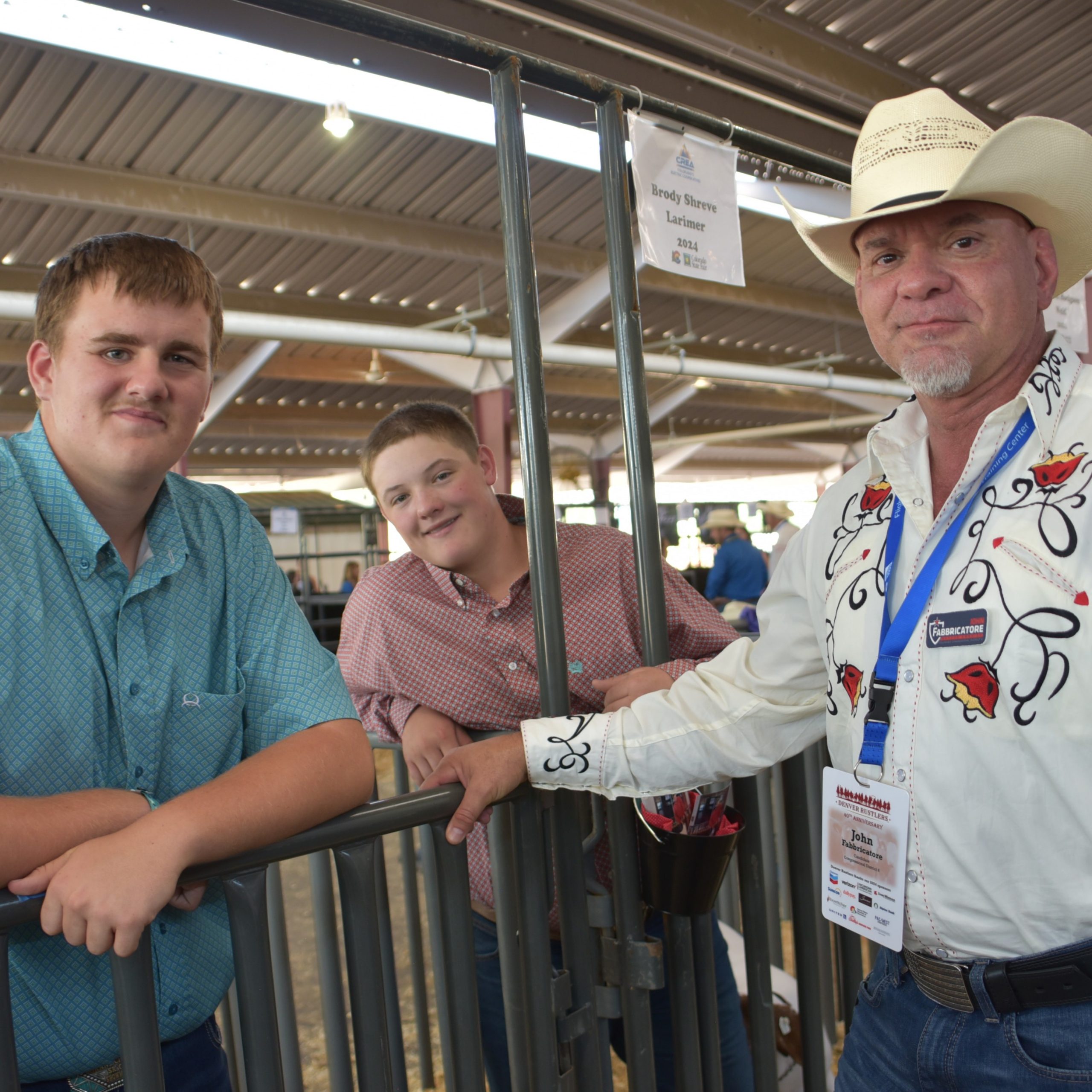 Corbin Jagers, left, and Brody Shreve talk with Rustler John Fabbricatore