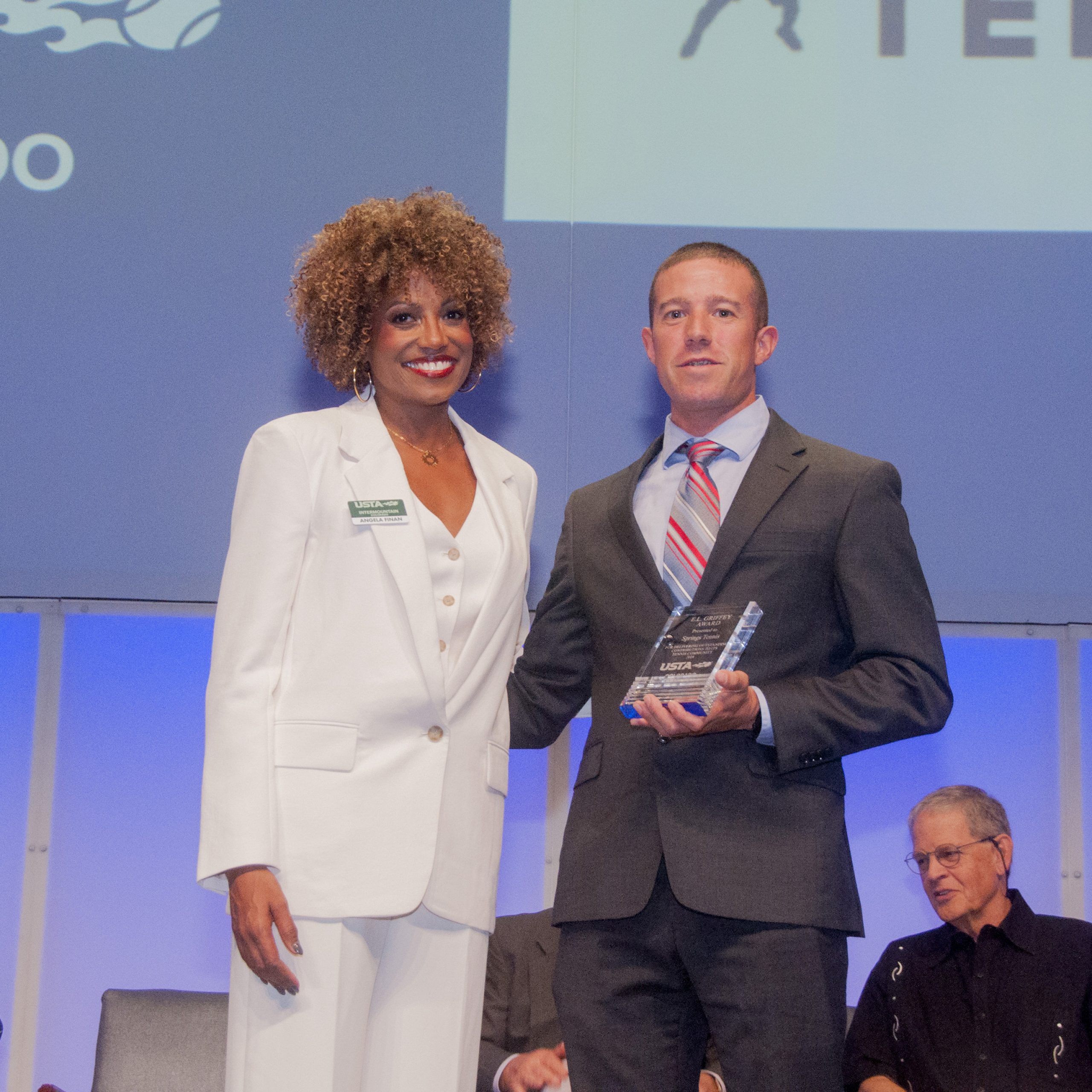 Angela Finan, Patrick Ramirez accepting award for Springs Tennis ...