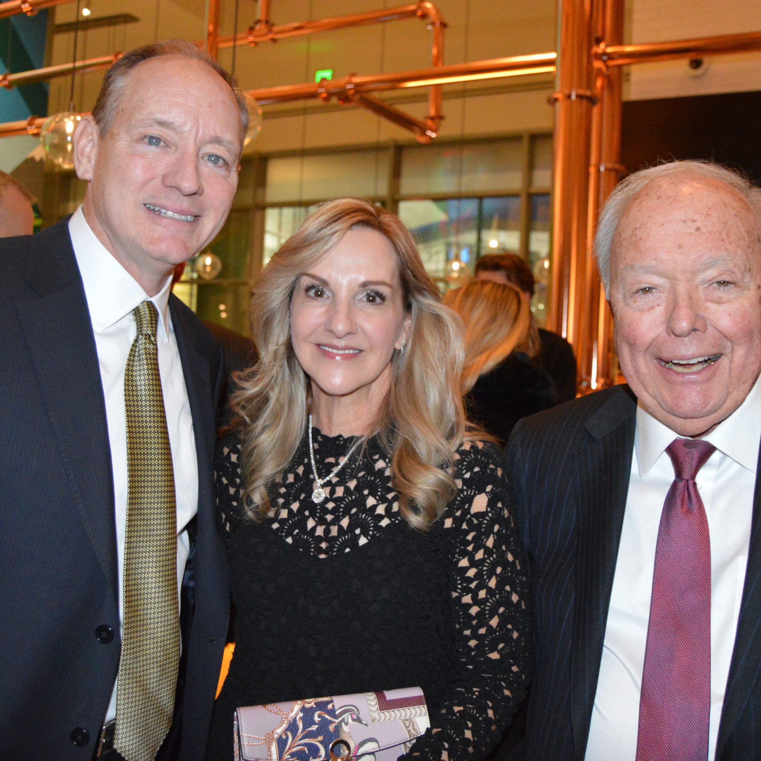 Mike and Patti Imhoff (left) with William Hybl
