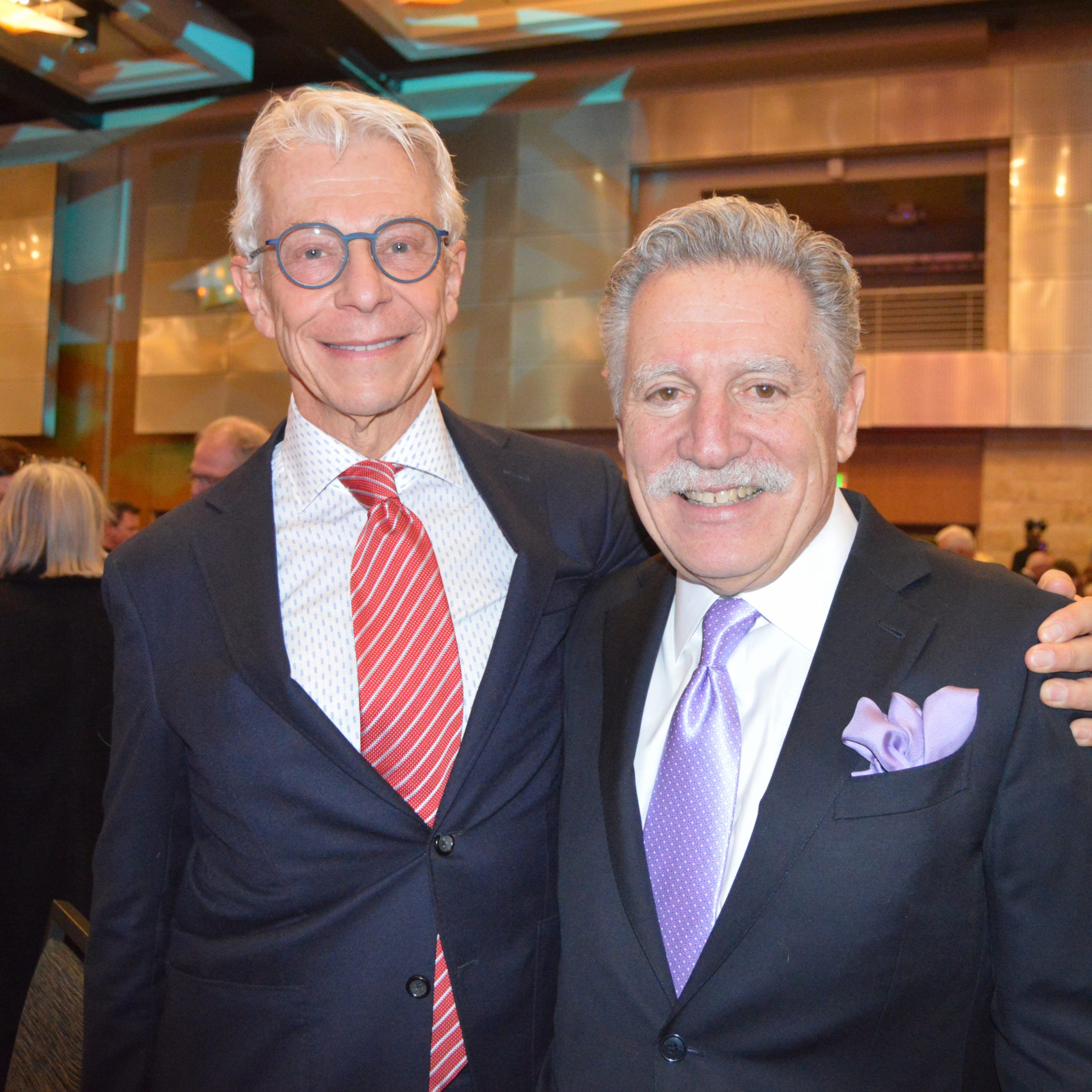 Sage business partners Zack Neumeyer and 2025 laureate Walter Isenberg ...