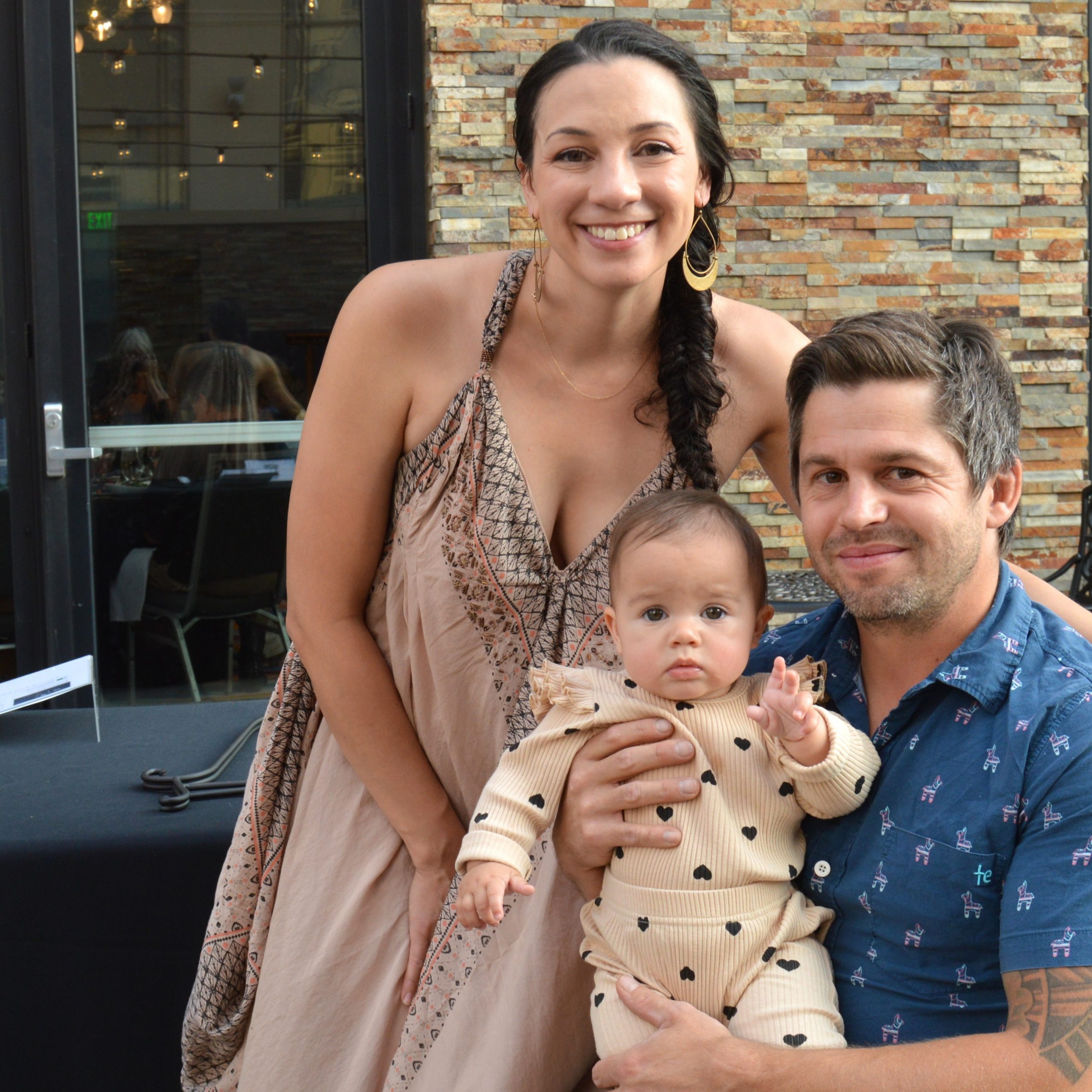 Kasandra and Ryan Strong with their pride and joy